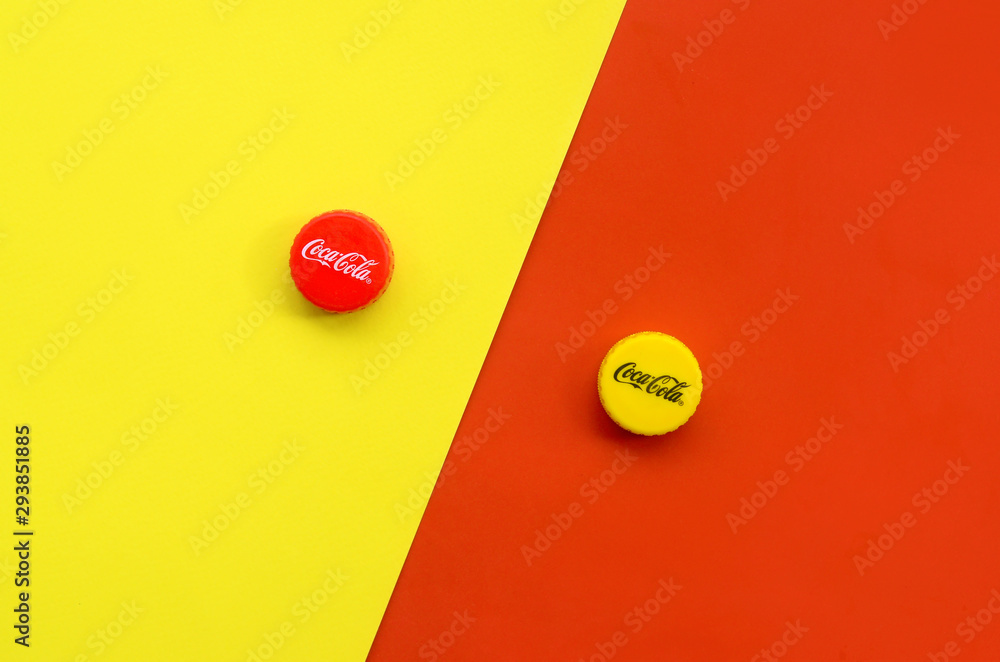 Single red and yellow bottle lids with Coca Cola logo on yellow and red ...