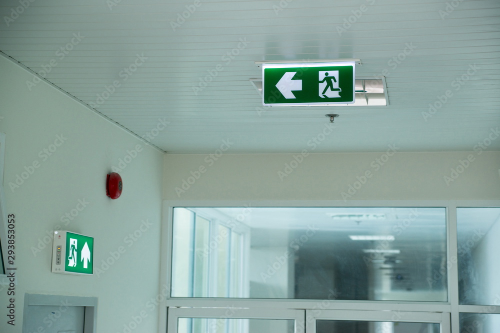 Sign : Emergency exit sign at path way indoor building public facility ...