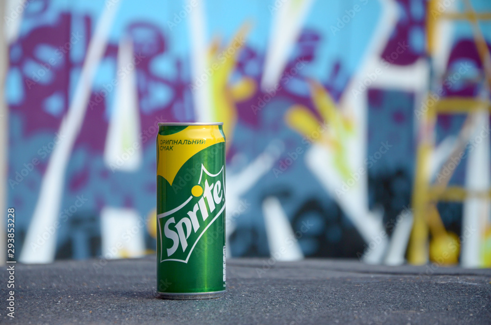 Sprite classic drink can on blurred colorful background outdoors Stock ...