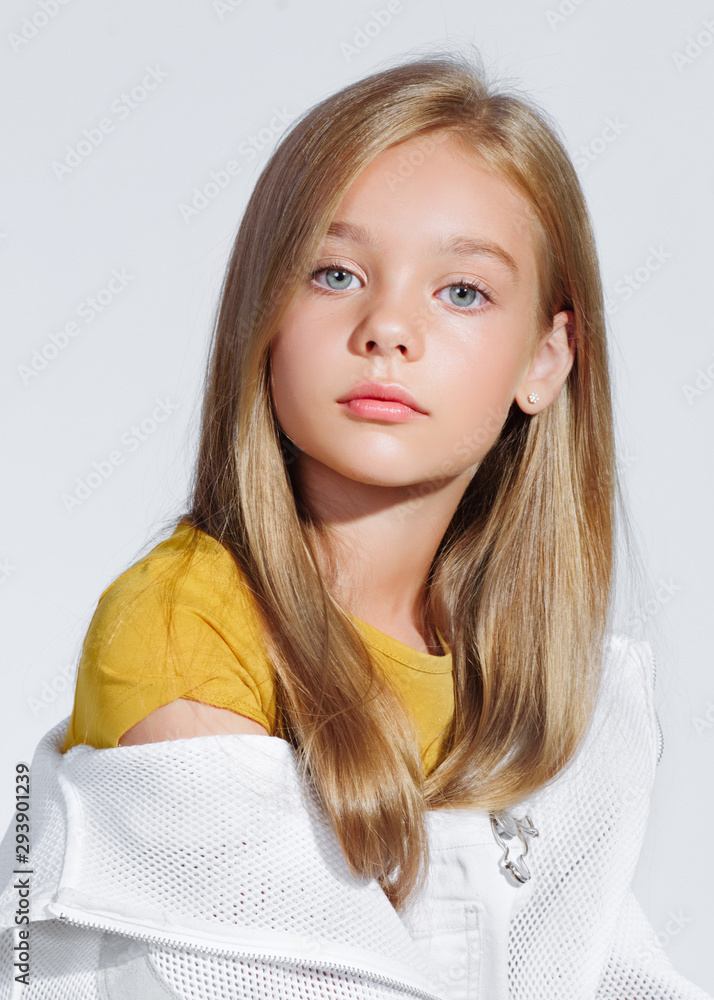 portrait of little model girl in studio Stock Photo | Adobe Stock