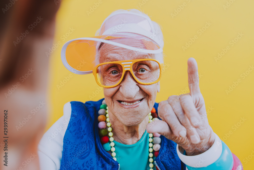Foto de Funny grandmother portraits. 80s style outfit. trapstar taking ...