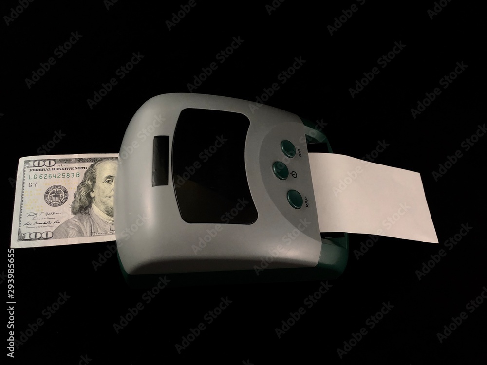Detector for checking and counting banknotes. Making dollars from paper ...