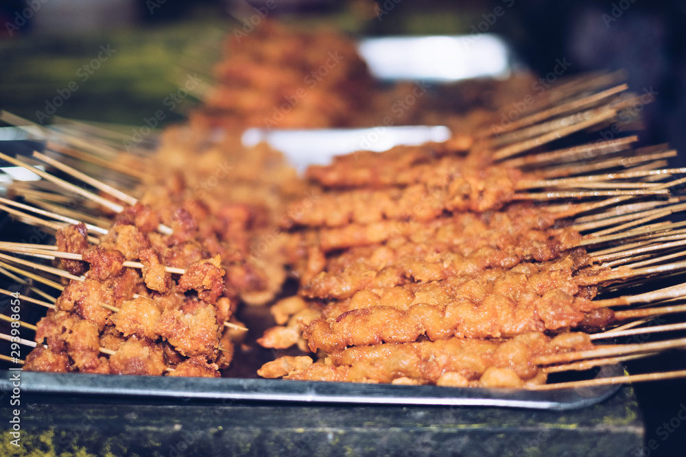 Two of the Philippine's street food on aluminium plate - the deep fried ...