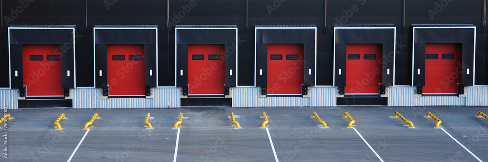 Empty loading dock of a large warehouse. Stock Photo | Adobe Stock