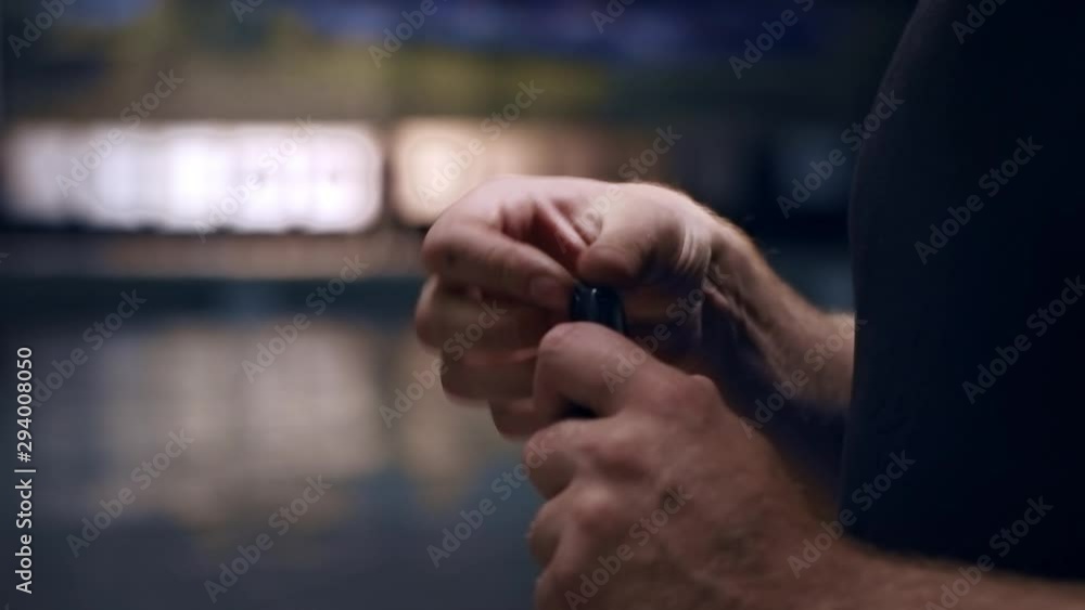 Shooting gallery. A young man preparing the gun and shooting with a ...