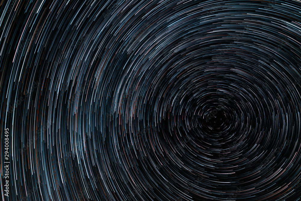 Beautiful starry sky with star trails orientation on the north star ...