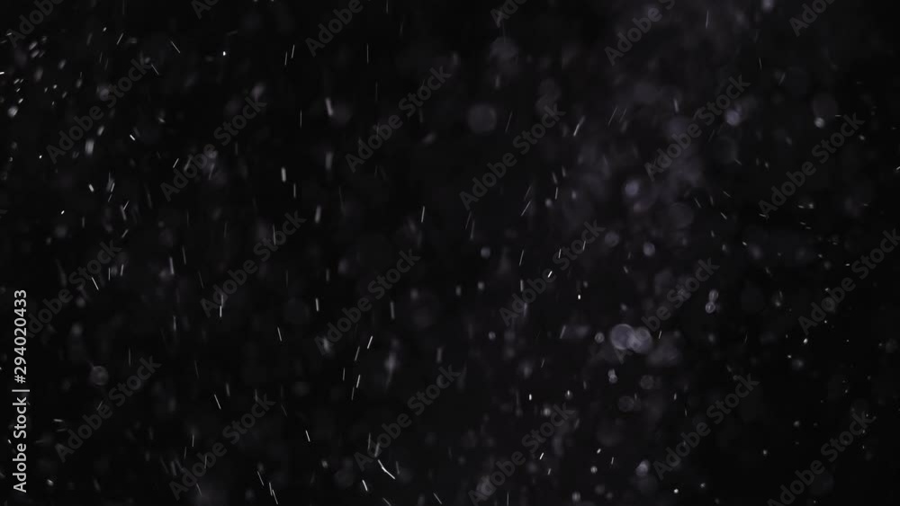 Real frames of frosty snow particles with beautiful bokeh Symbol of New ...