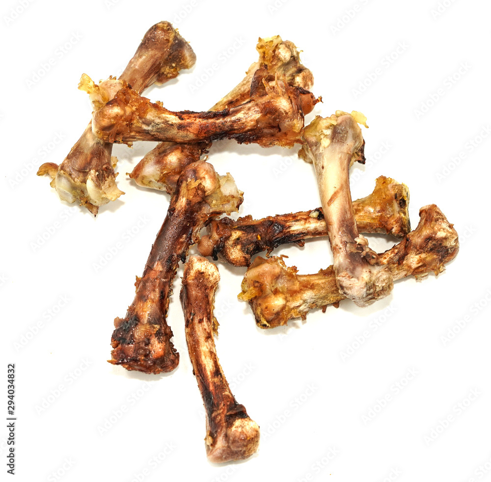 Small bones on a white background. food scraps. chicken bones Stock ...