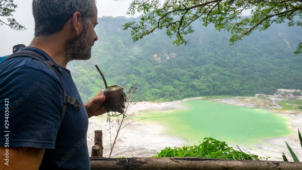 Man drinking Mate at Laguna de Alegria at the Tecapa volcano, El ...