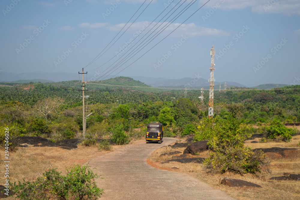 Tuk tuk on road of India, back view Stock Photo | Adobe Stock