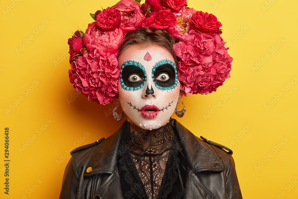 Scary woman wears horror Halloween makeup, has frightened expression ...