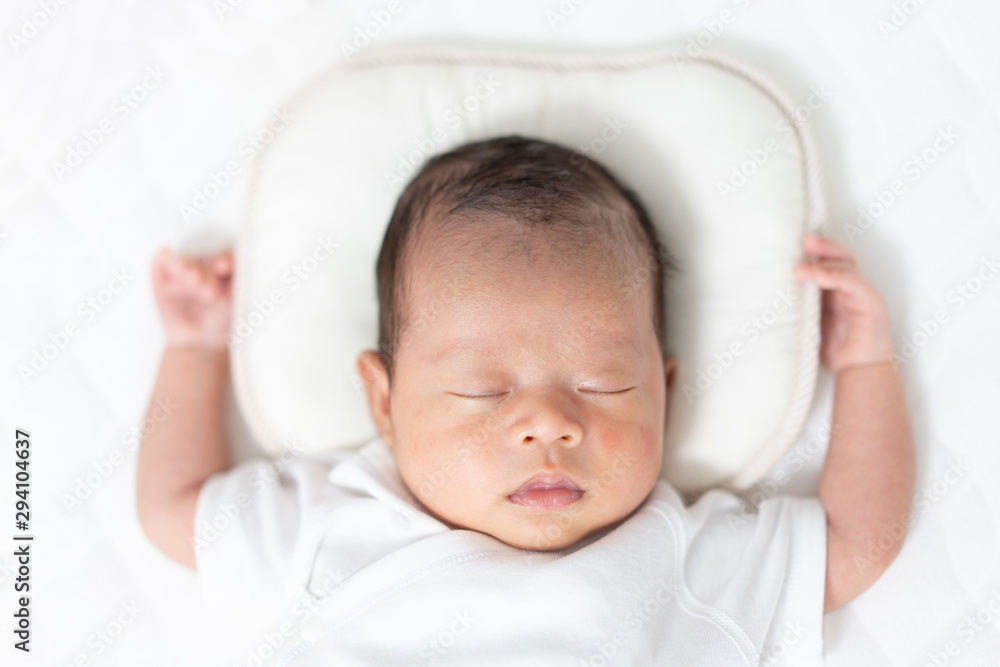 Baby sleeping on a crib Stock Photo | Adobe Stock