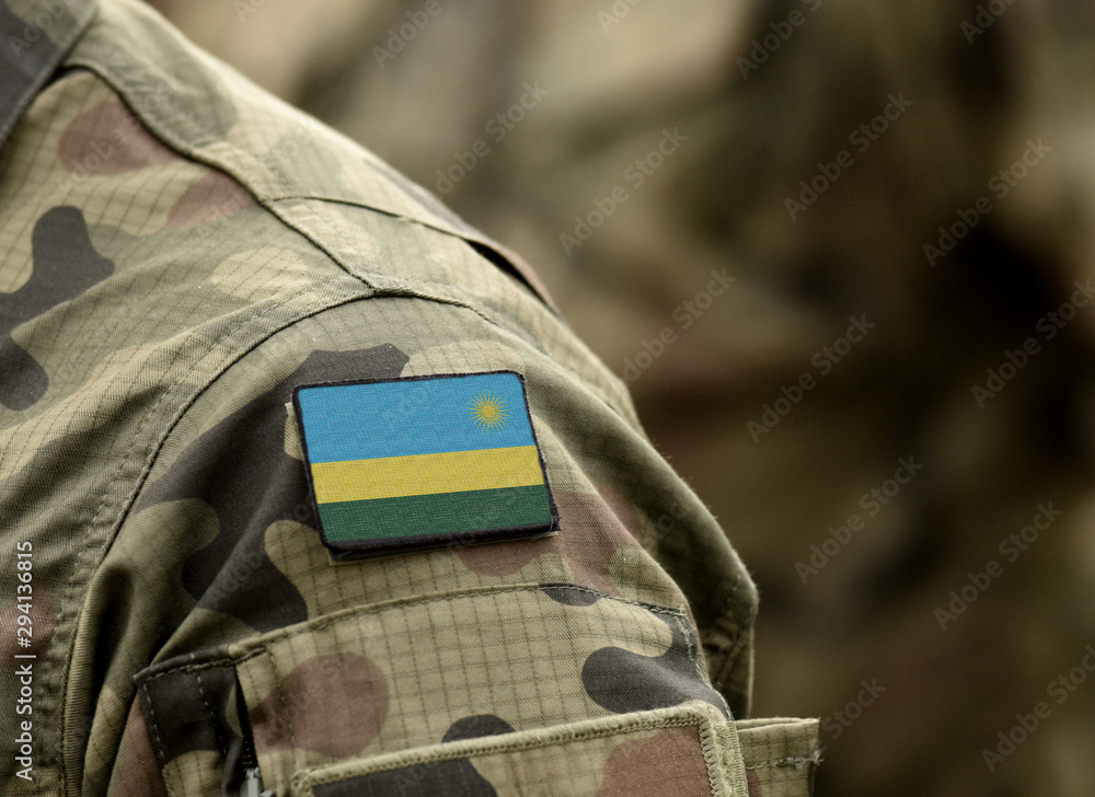 Fotografia do Stock: Flag of Rwanda on soldiers arm. Rwanda flag on ...