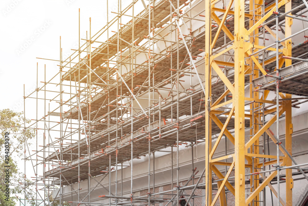 Poster Construction scaffolding as temporary structure for support ...