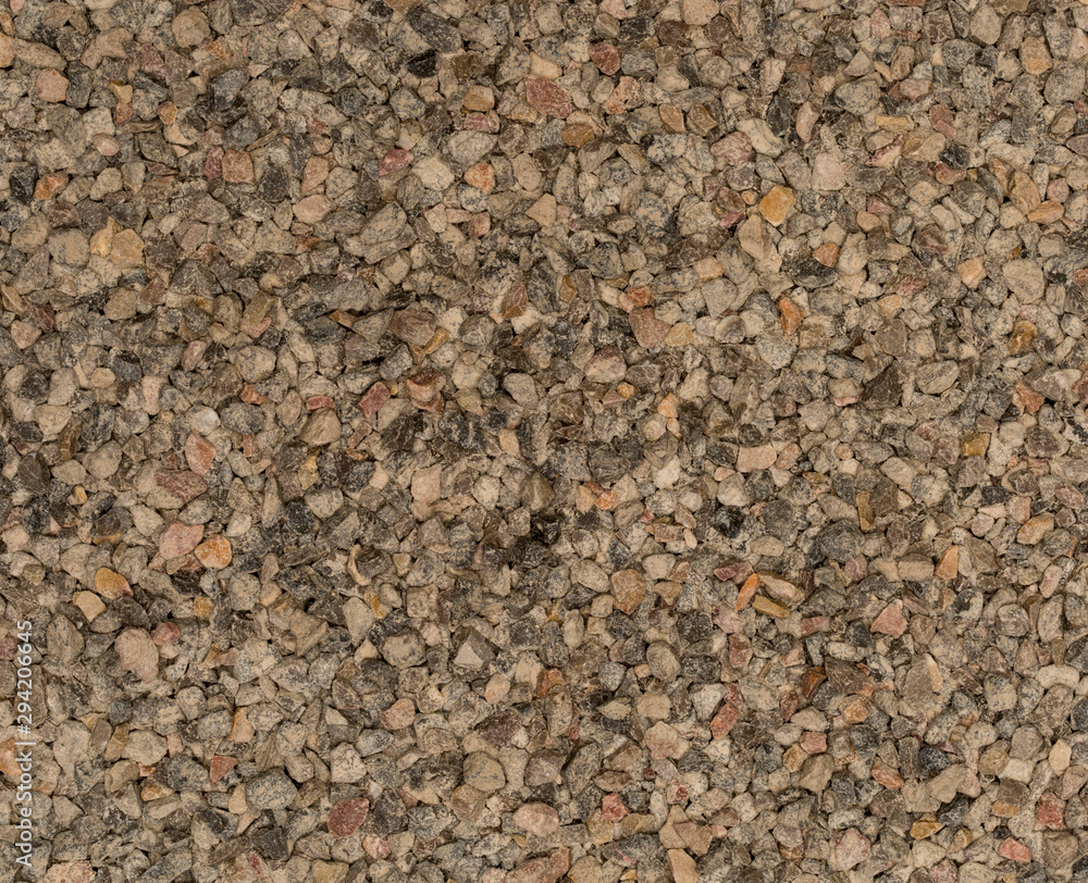 Vue gros plan d'une texture de pierre et gravier marron et ocre humide ...