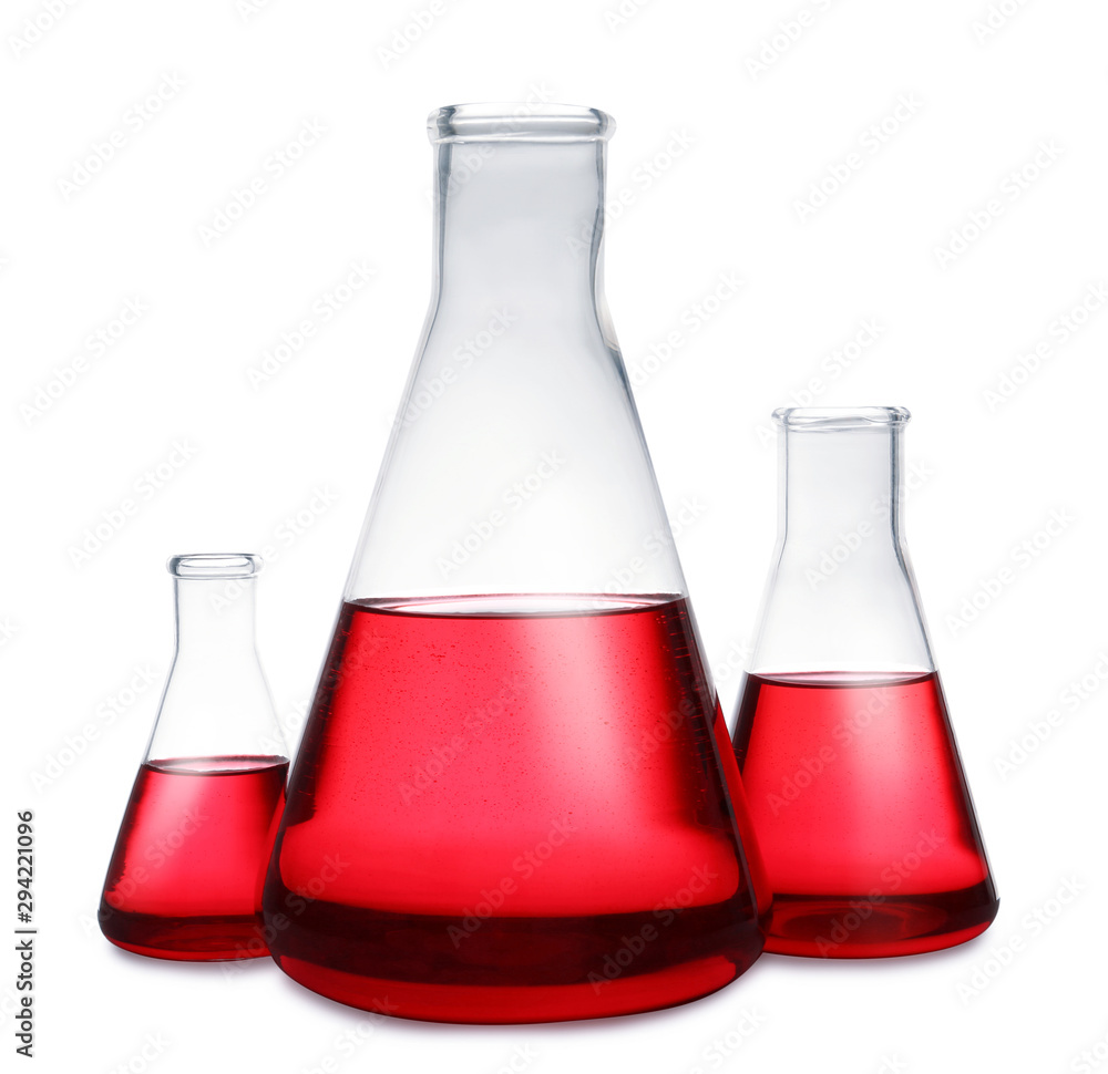 Conical flasks with red liquid on white background. Laboratory ...