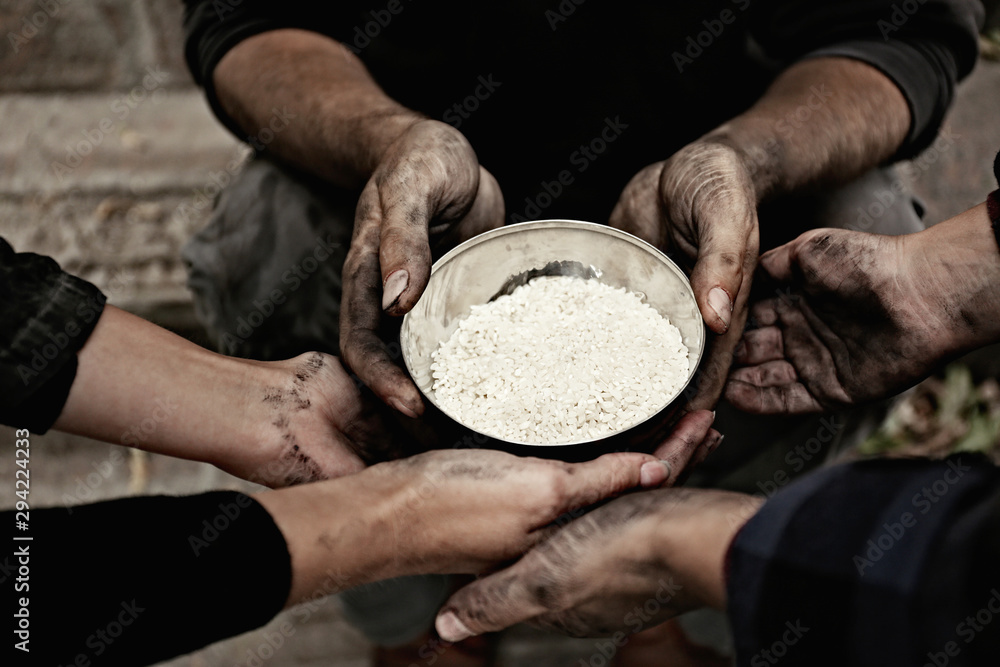 Poor homeless people with bowl of rice outdoors, closeup Stock Photo ...