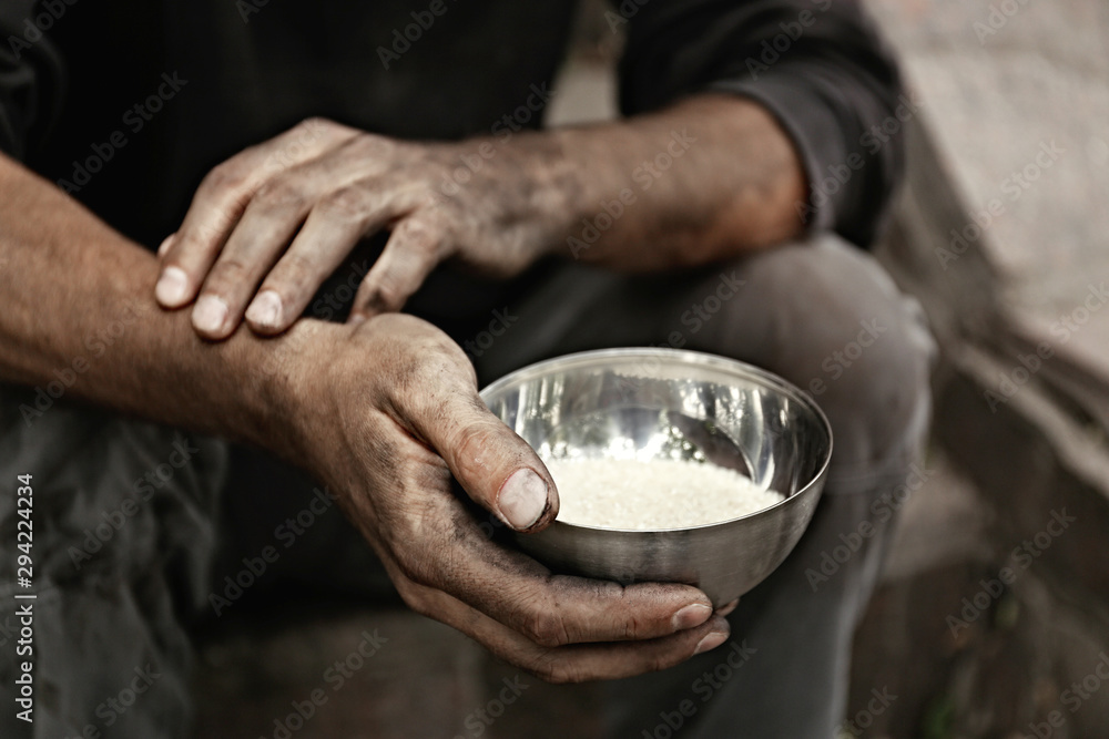 Poster Poor homeless man with bowl of rice outdoors, closeup – Wall Art ...