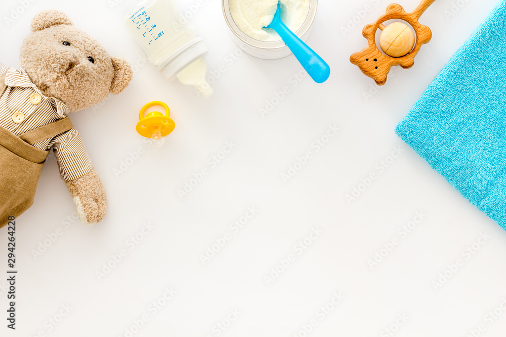 Baby food background with toys and accessories on white table top view ...