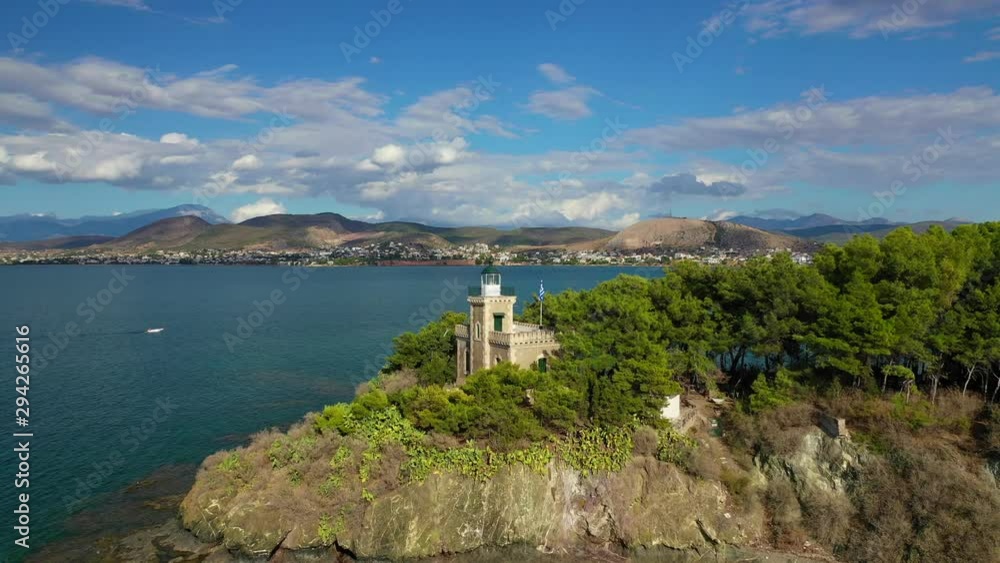 Aerial drone video of famous lighthouse built in small island in town ...