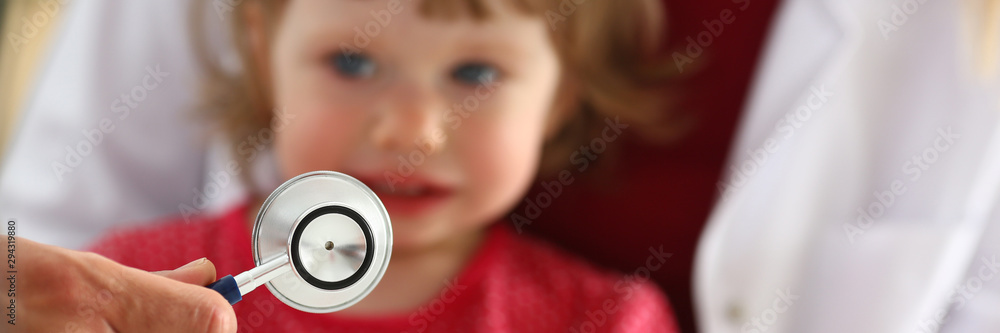Little scared child at doctor reception make insulin shot. Physical ...