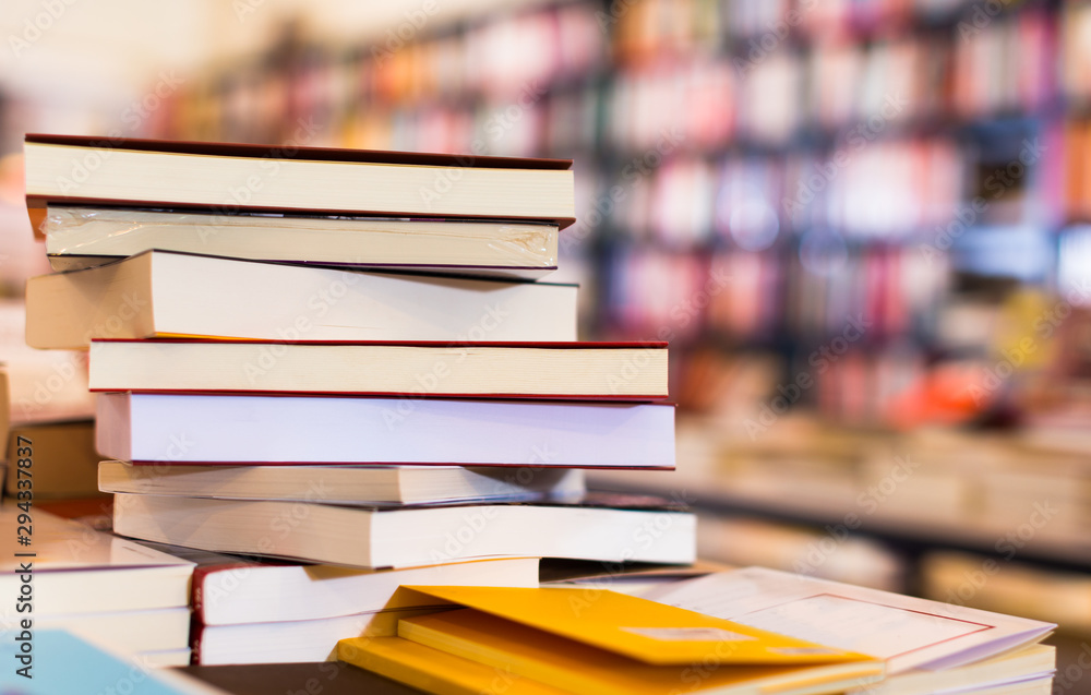 different books lying on table in library Stock Photo | Adobe Stock