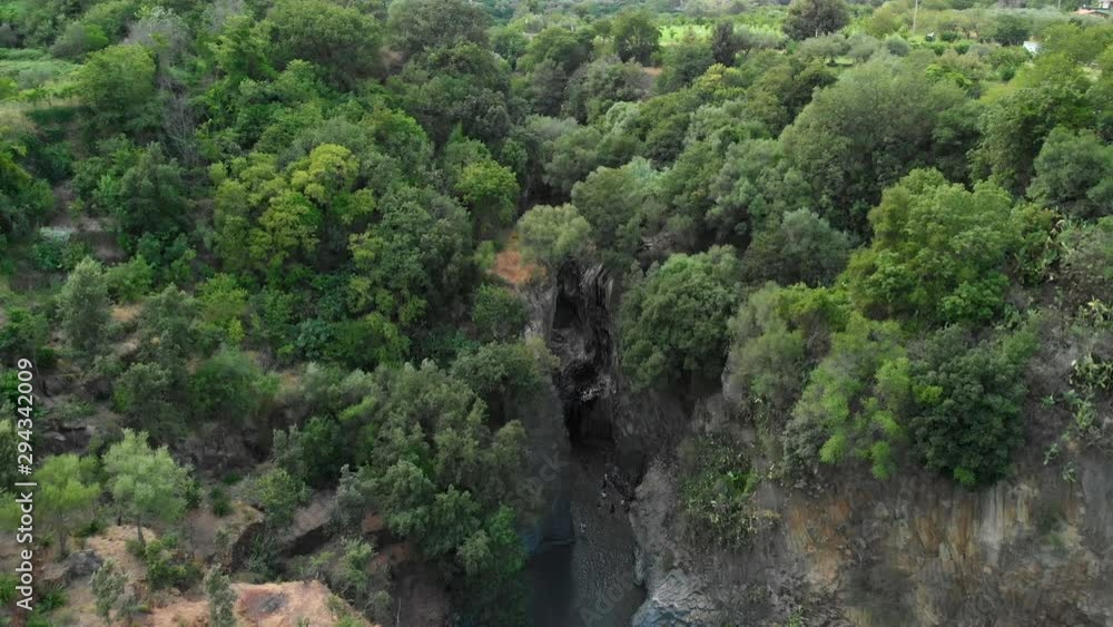 4K AERIAL DOLLY IN: Drone flying above Alcantara Gorges, an impressive ...