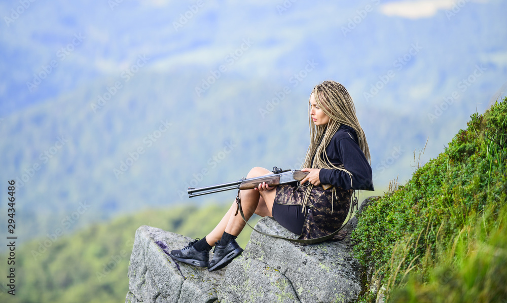 Hunting season. Hunter mountains landscape background. Sexy warrior ...
