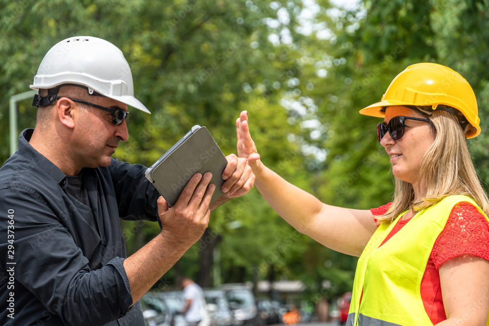 Conflict and disagreement at work on construction site. Angry ...