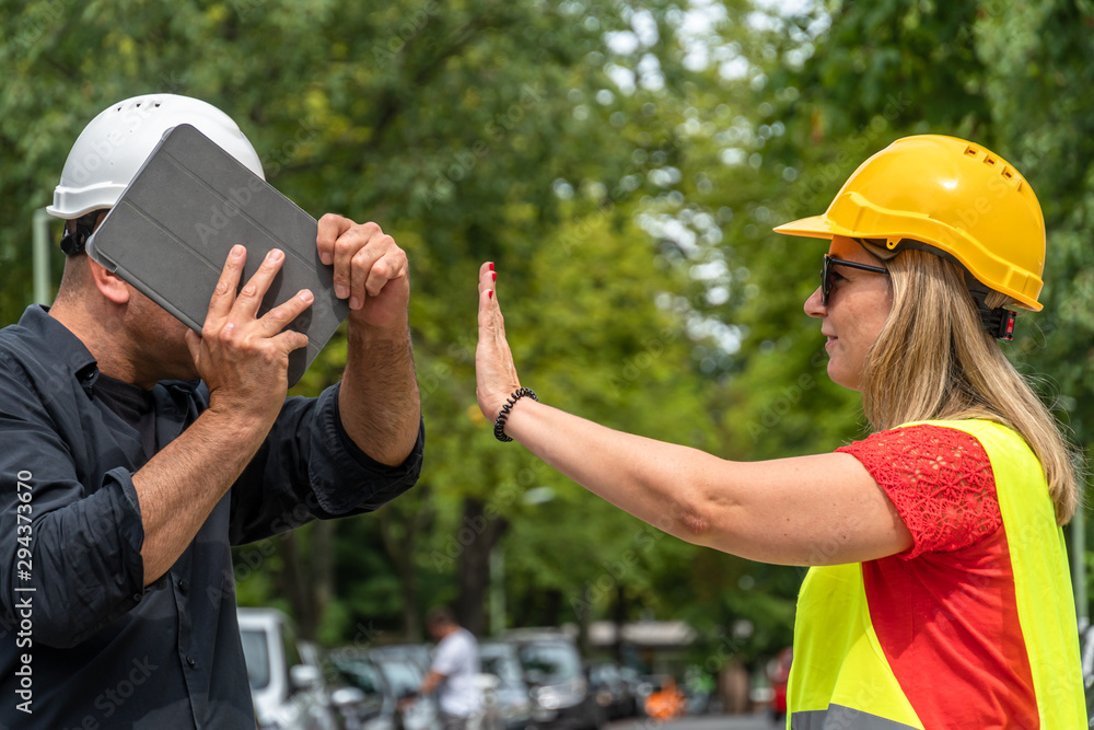 Conflict and disagreement at work on construction site. Angry ...