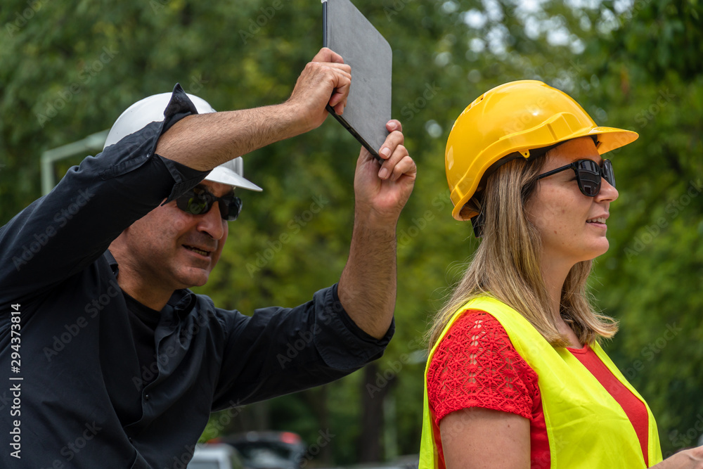 Conflict and disagreement at work on construction site. Angry ...