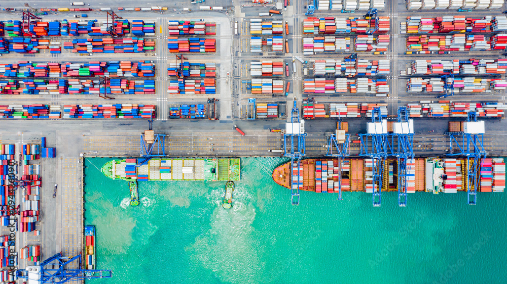 Top view of Deep water port with cargo ship and containers. It is an ...