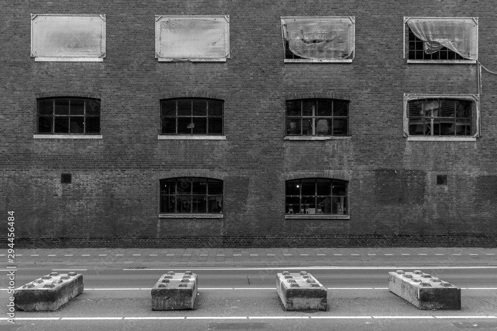 Public road with road blocks in the shape of giant blocks to keep ...