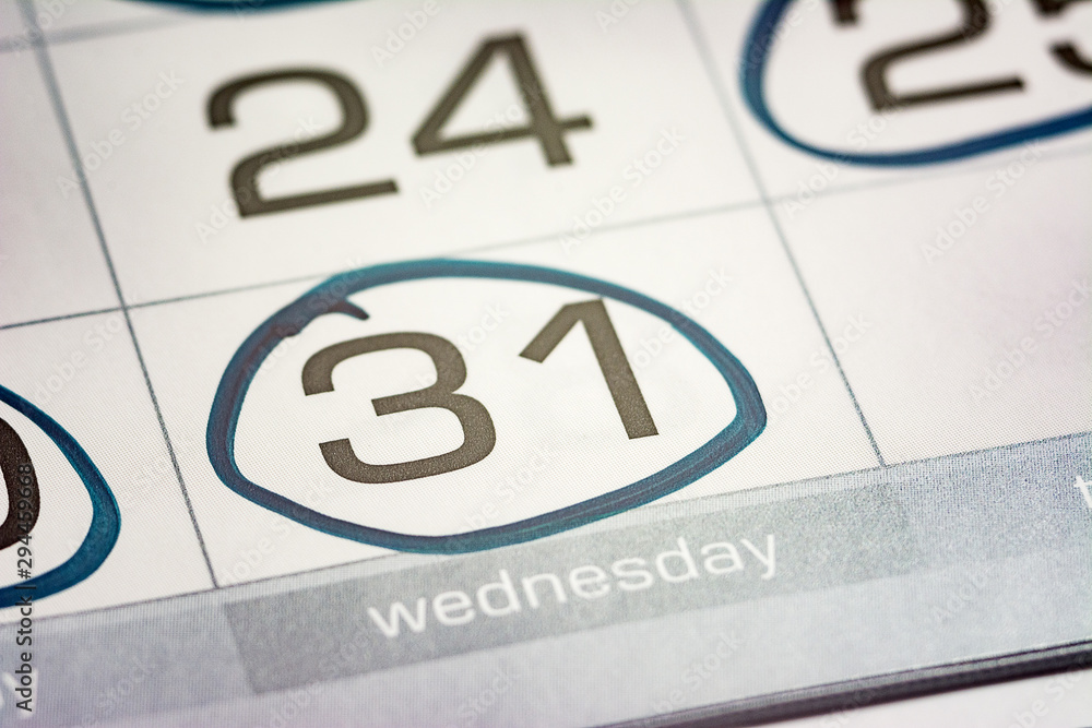 the thirty-first day of the month highlighted on the calendar with a ...