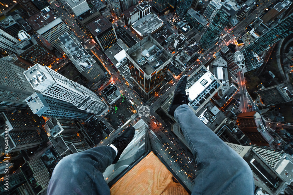 Person Looking Down From A Building