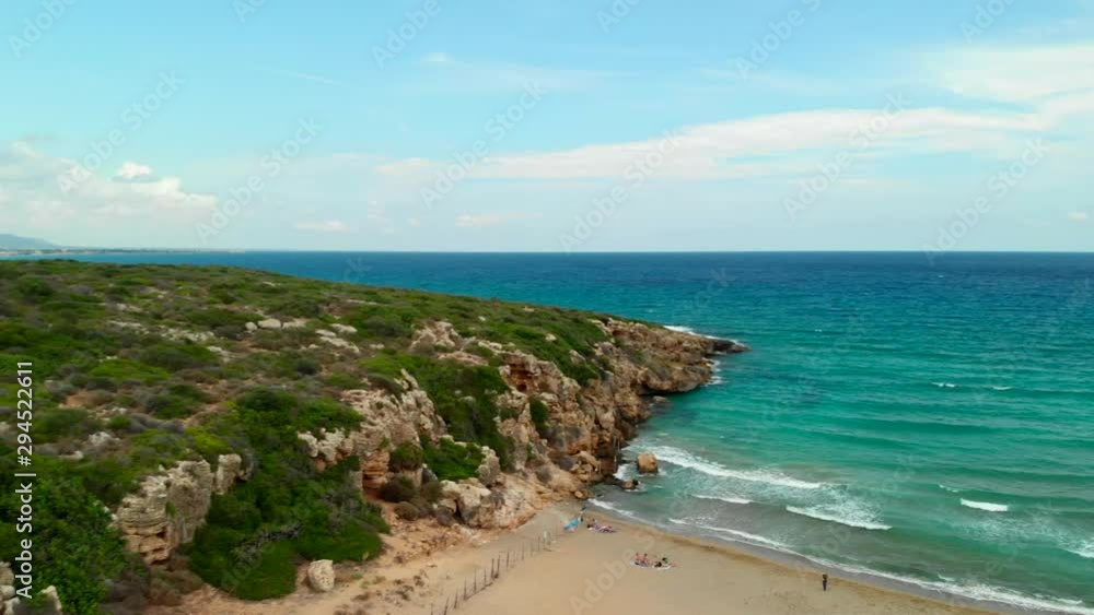 AERIAL TURN RIGHT: Drone flying over Calamosche beach, in the Vendicari ...