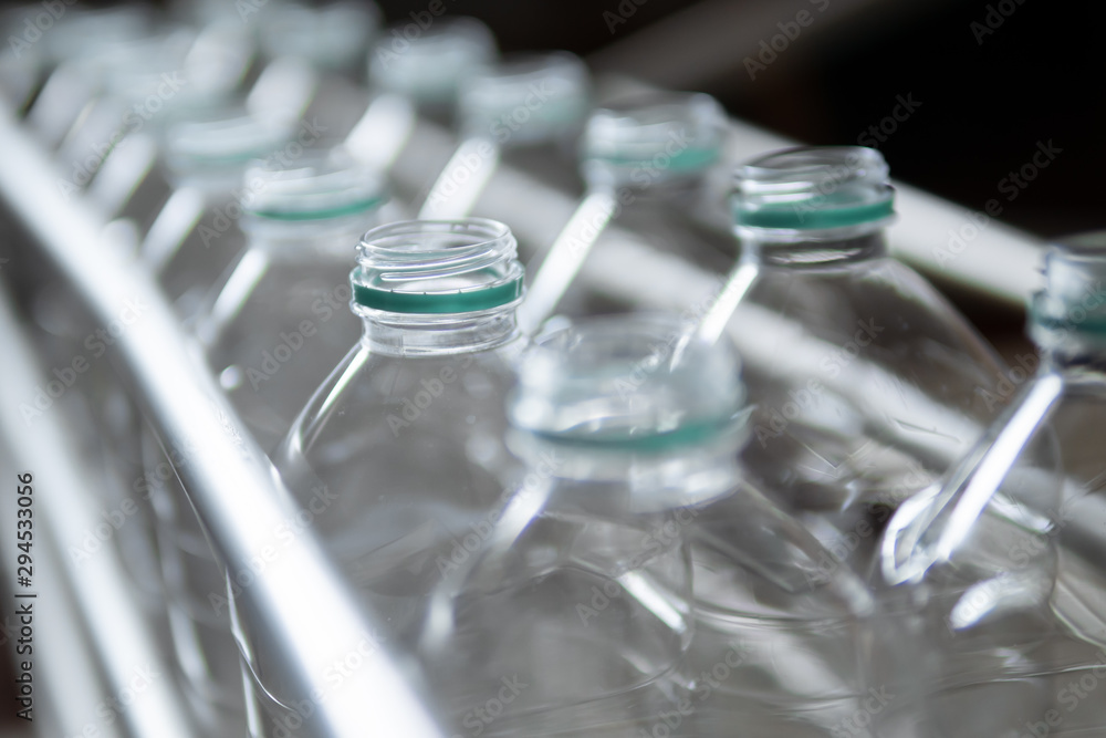 Empty single-use plastic water bottles Stock Photo | Adobe Stock