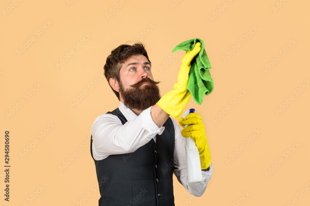 Professional cleaning man in uniform. Male janitor with cleaning ...