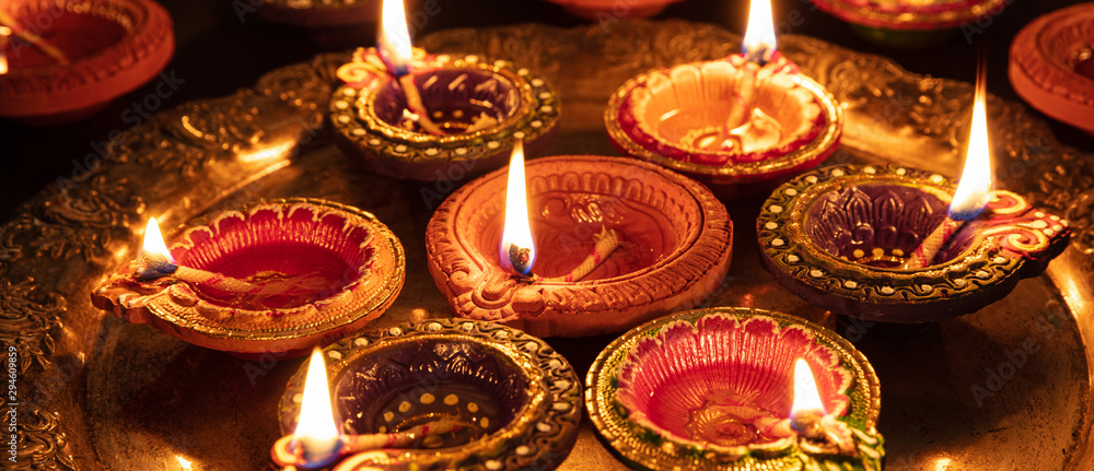 Diwali, Hindu festival of lights celebration. Diya oil lamps against ...