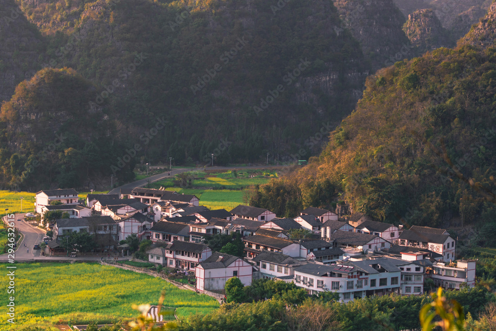 Rapeseed flower field and villages at Wanfenglin National Geological ...