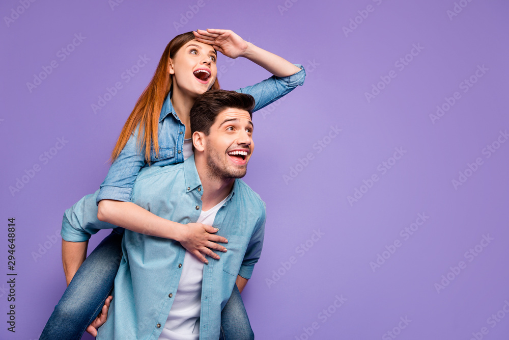 Portrait of excited funny funky two people look at sky space hold hand ...