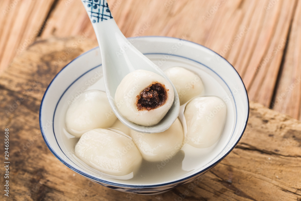 Tang Yuan(sweet dumplings) made from glutinous filled with black sesame ...