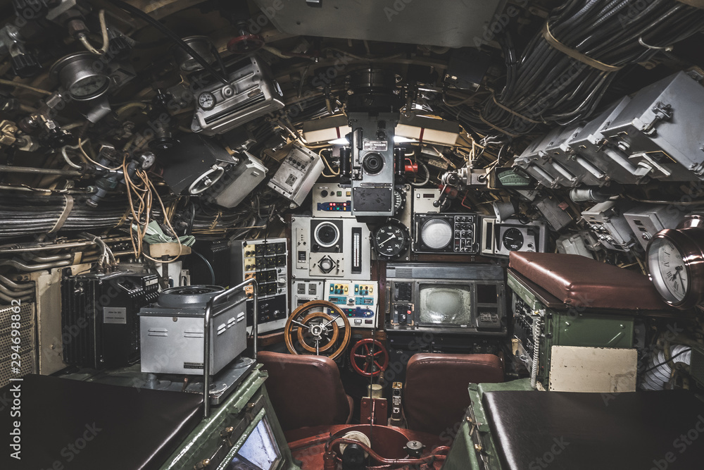 Interior of old combat submarine compartment with devices of control ...