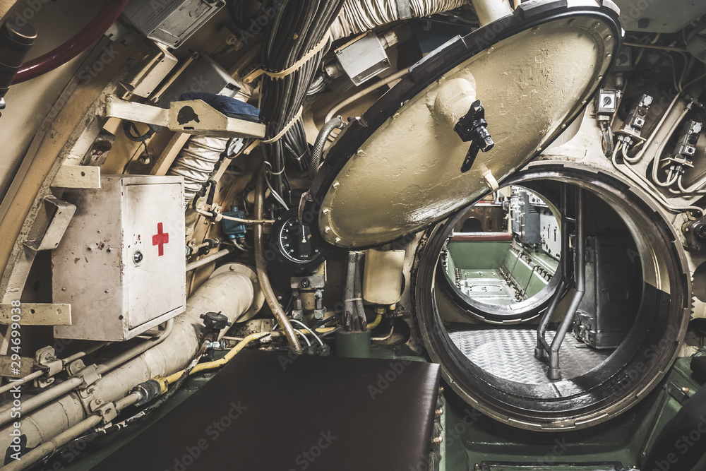 Interior of old combat submarine compartment with devices of control ...