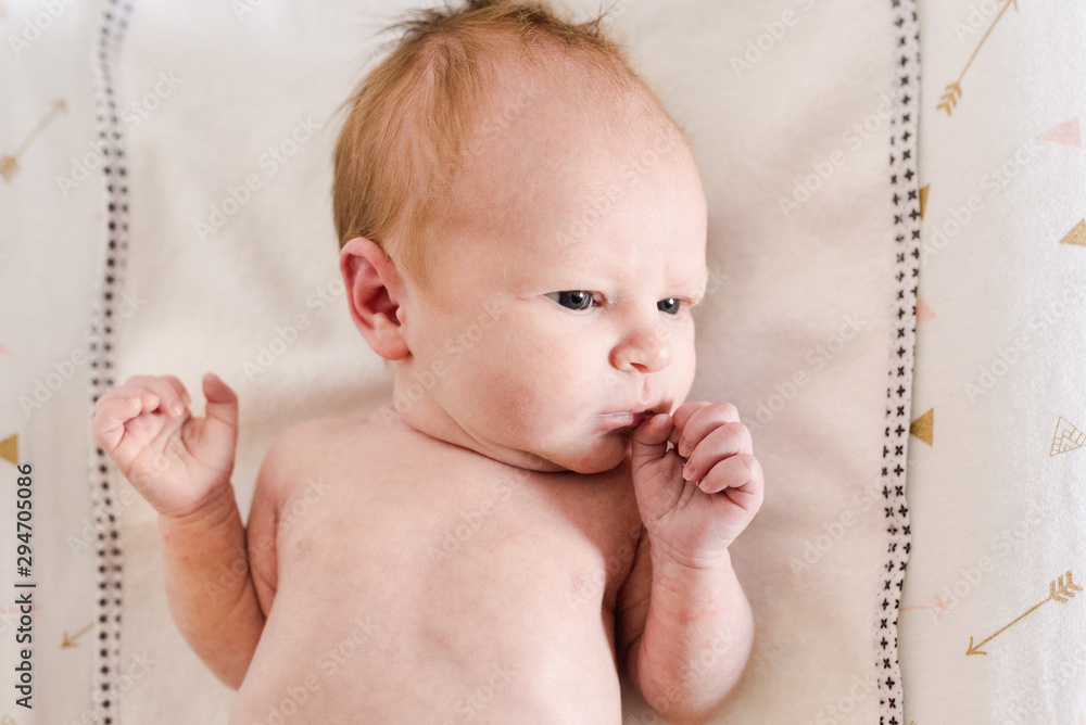 newborn baby with red hair Stock Photo | Adobe Stock