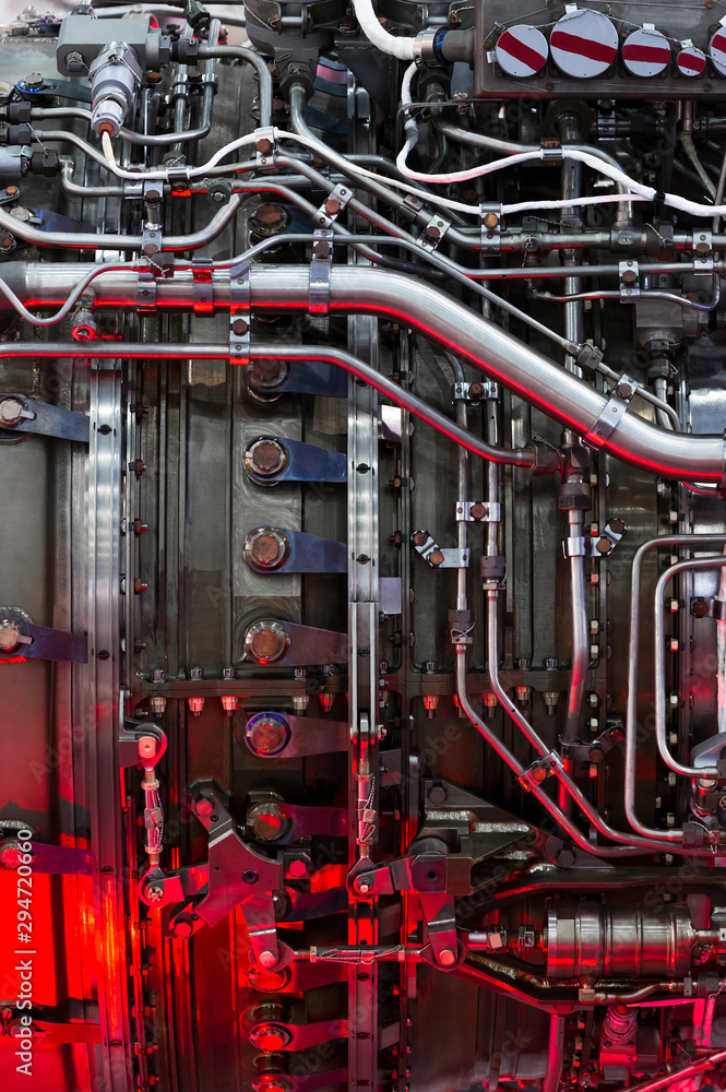 Engine of fighter jet with hydraulic, fuel pipes and other equipment ...