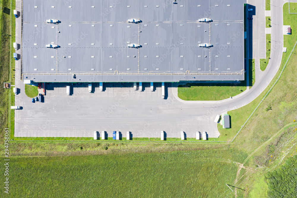 aerial top view of warehouse storage with trucks for loading goods ...