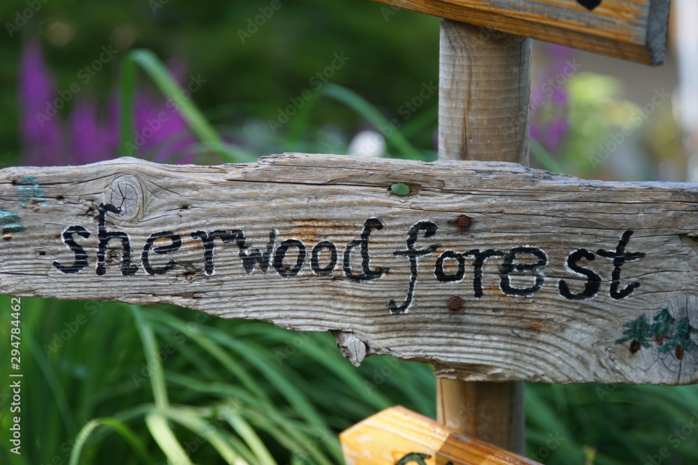 signs with the names of fantasy forests Stock Photo | Adobe Stock