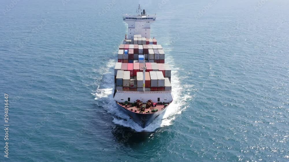 Large Container ship loaded with various colours and brands of shipping ...