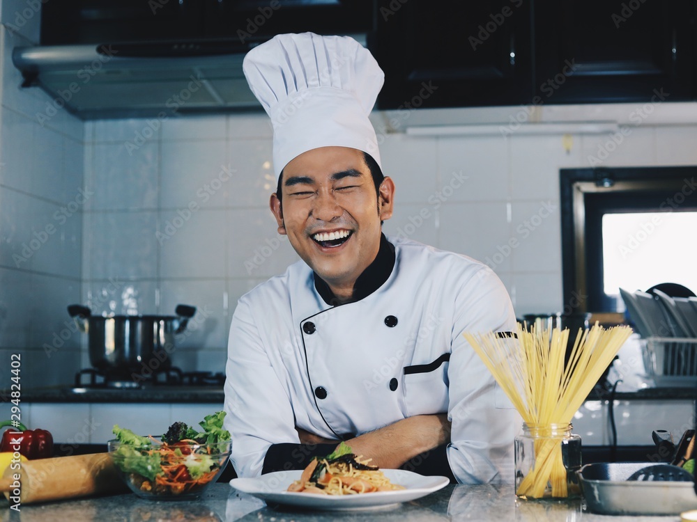 chef in the kitchen Stock Photo | Adobe Stock
